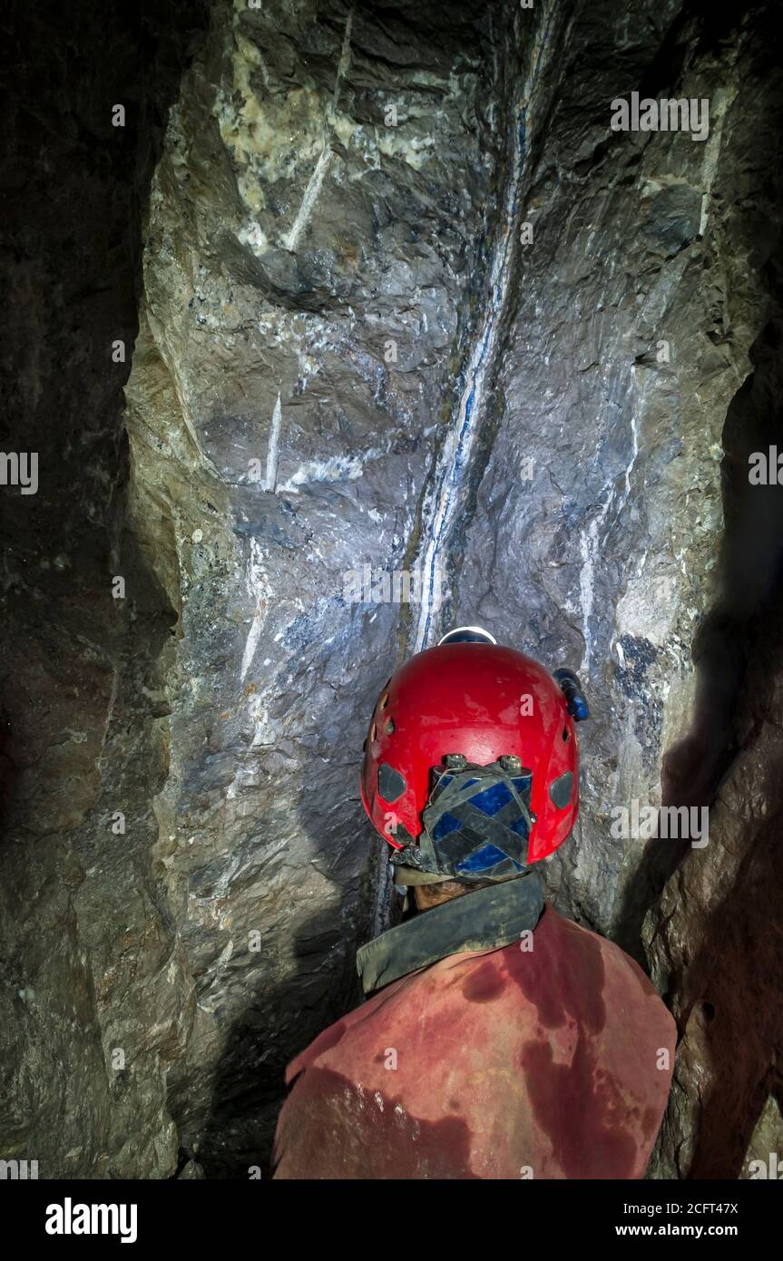 The remaining traces of a mineral vein with miners' gunpowder shotholes ...