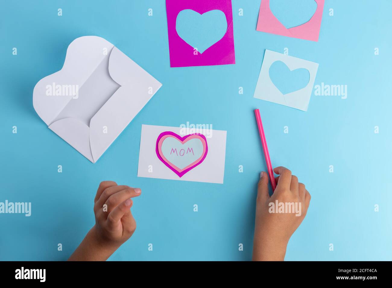 write a greeting card, paper craft made by a child Stock Photo - Alamy