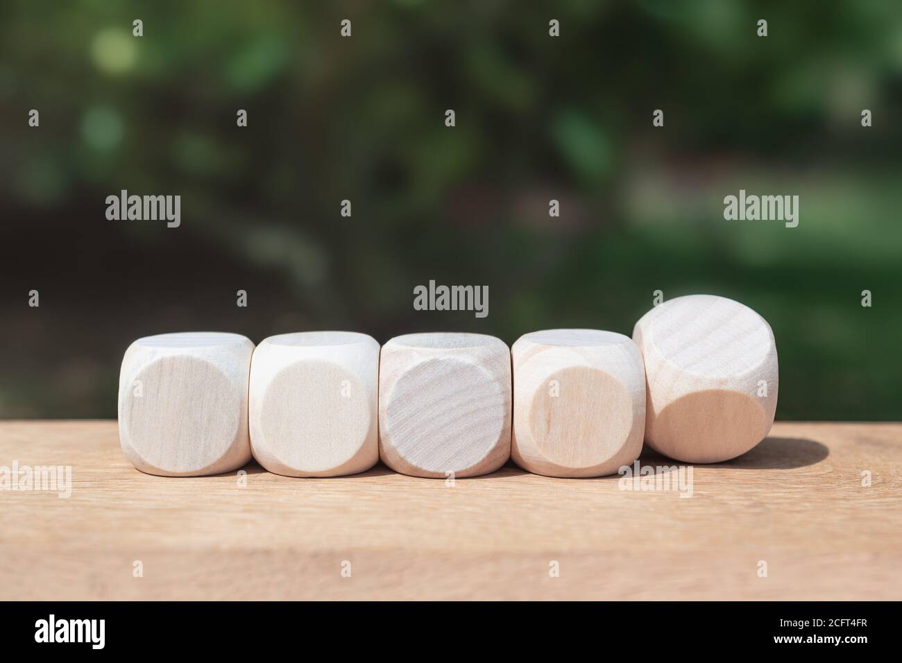Empty wooden blocks with with one inverted block. Mockup style ...