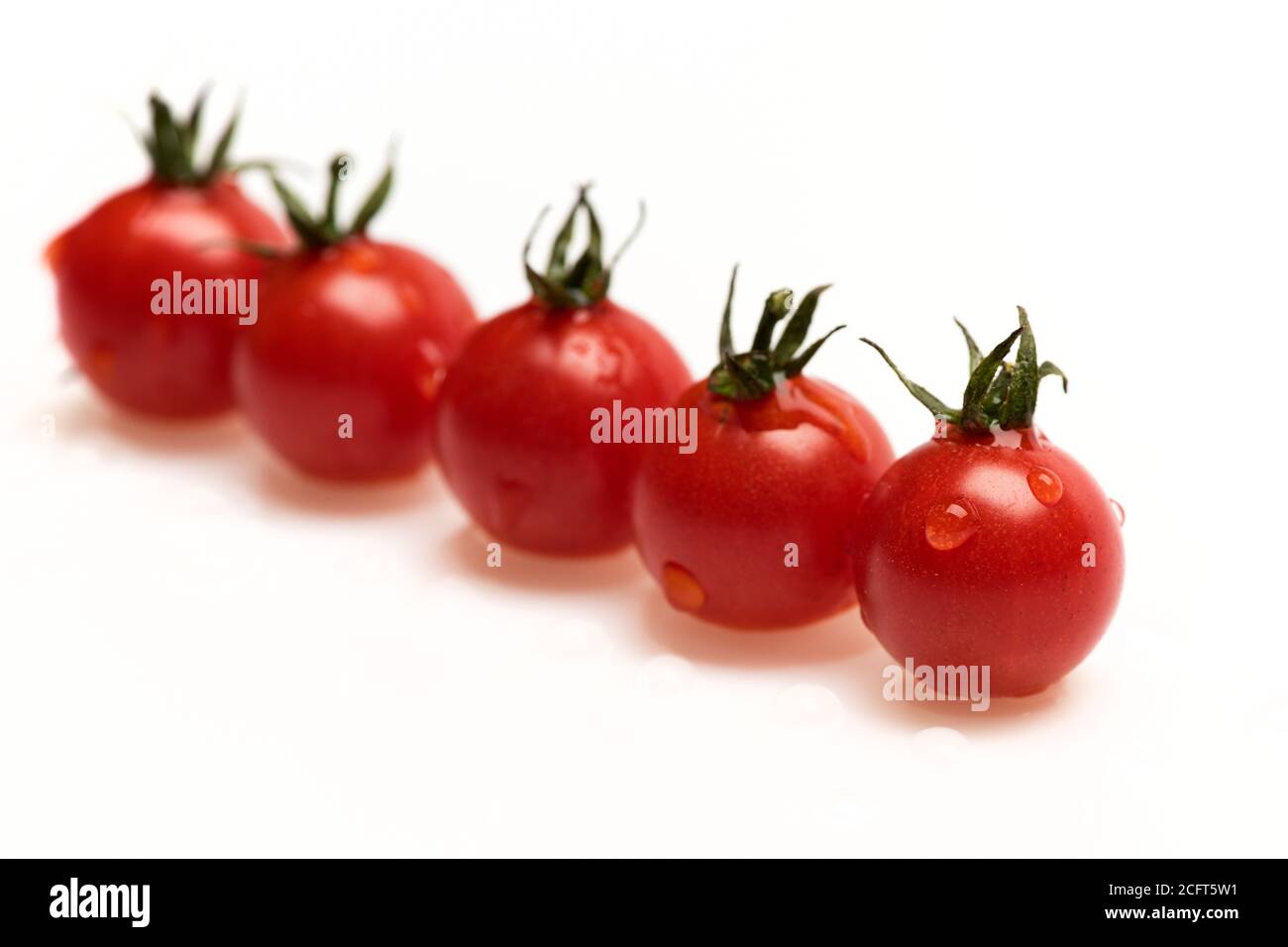 Bunch of cherry tomatoes in close up. Agriculture and fresh food ...