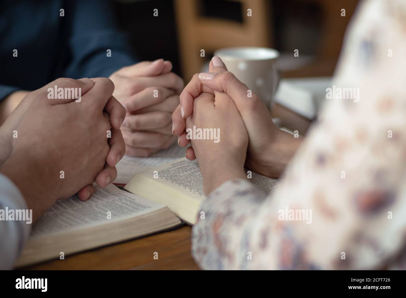 Christian worship and praise. Happy friends reading the bible together ...