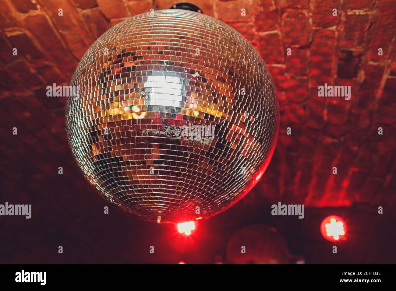 Colorful disco mirror ball lights night club background Stock Photo - Alamy