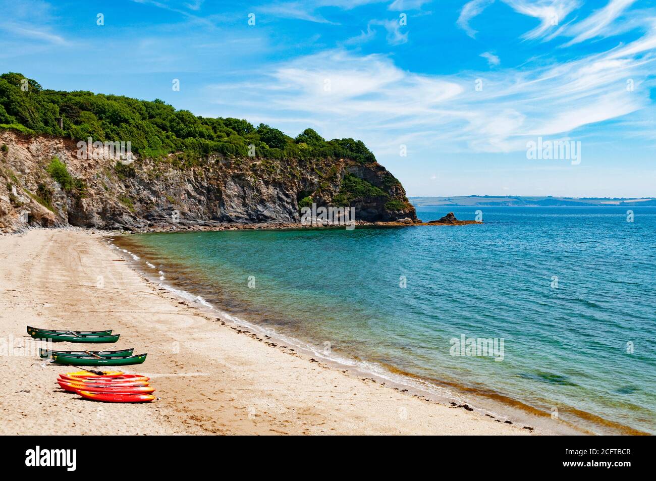 The secluded beach at porthpean near st austell in cornwall has a ...
