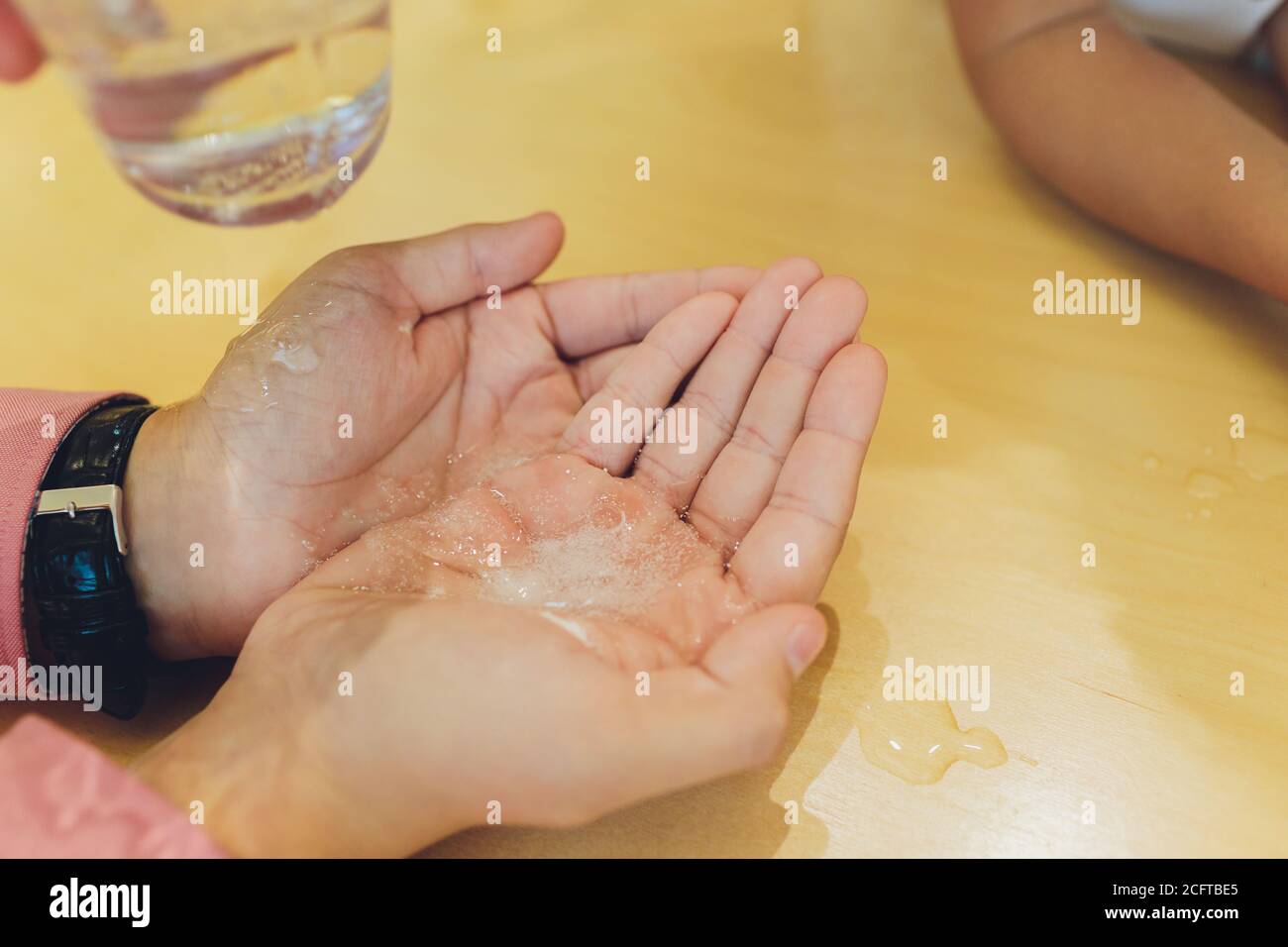Hand holding white polystyrene foam beads ball drop from Styrofoam ...