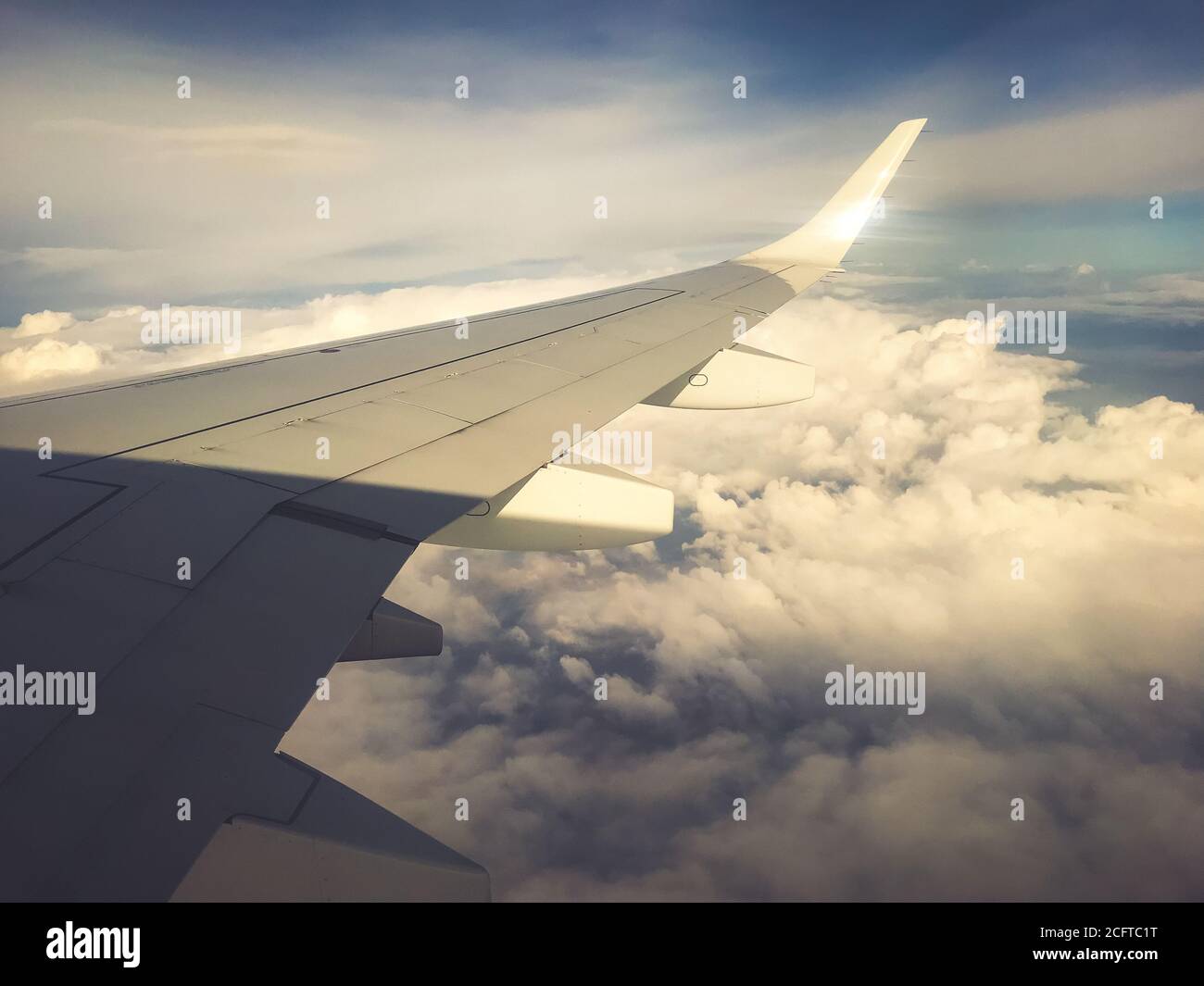 Sky and clouds view from inside an airliner plane Stock Photo - Alamy