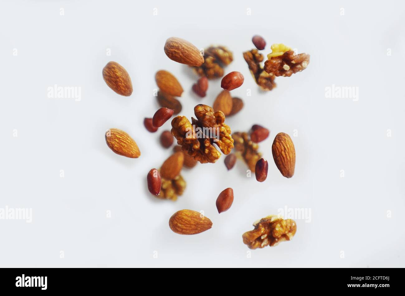 Flying nuts hi-res stock photography and images - Alamy