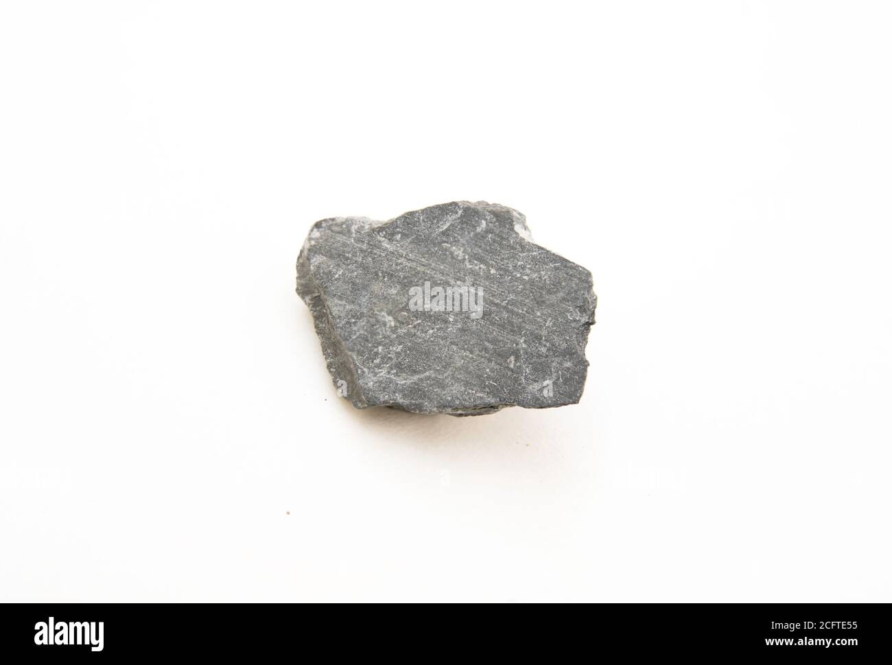 detail of white mica quartz slate isolated over white background Stock ...