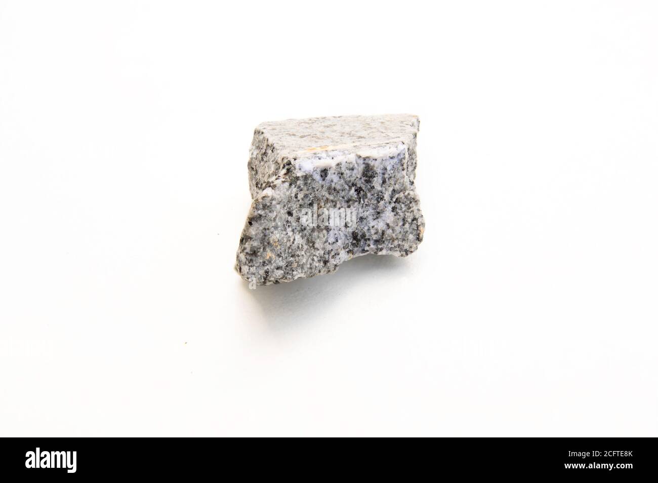 detail of diorite isolated over white background Stock Photo - Alamy