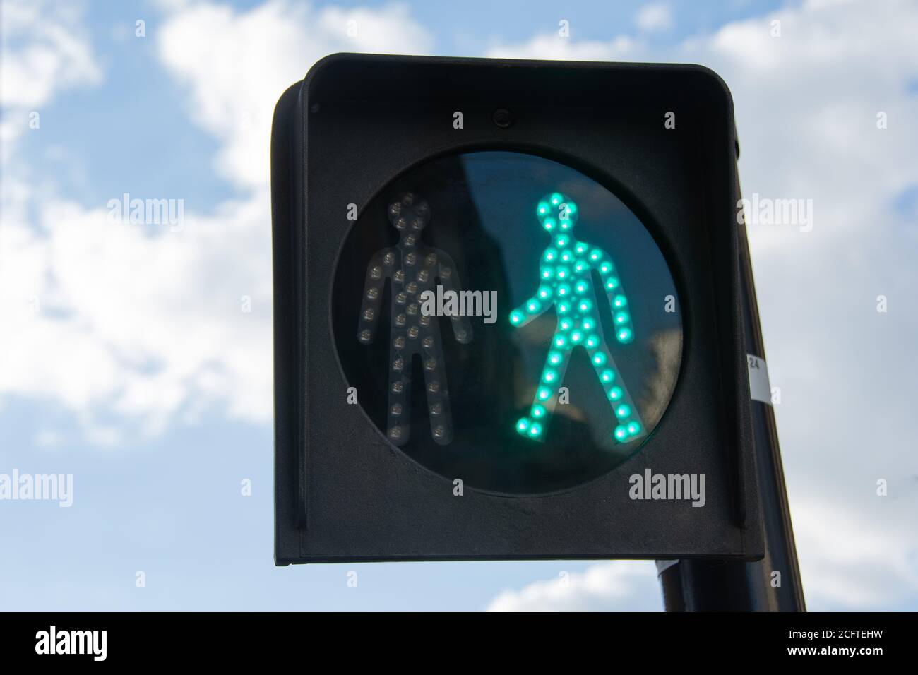 Pedestrian crossing green traffic light meaning "crossing allowed ...