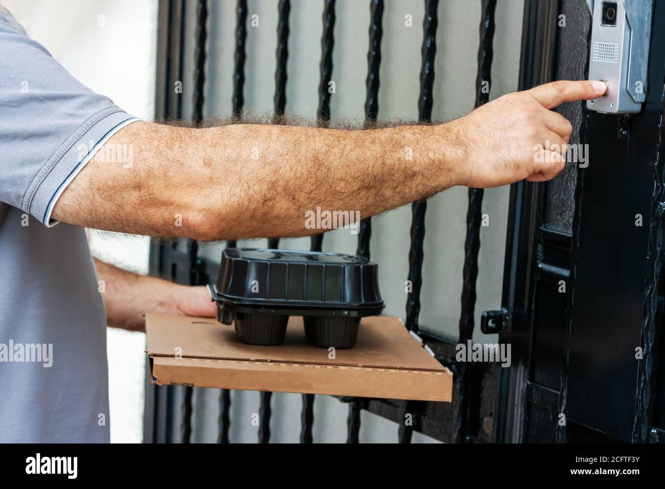 Food delivery service man with pizza cardboard and take away coffee ...