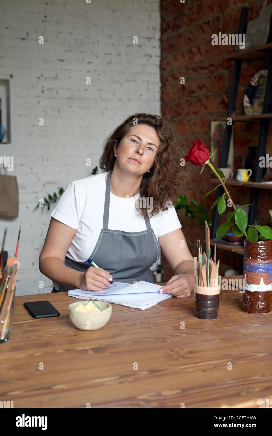 Female craftsperson chair hi-res stock photography and images - Alamy