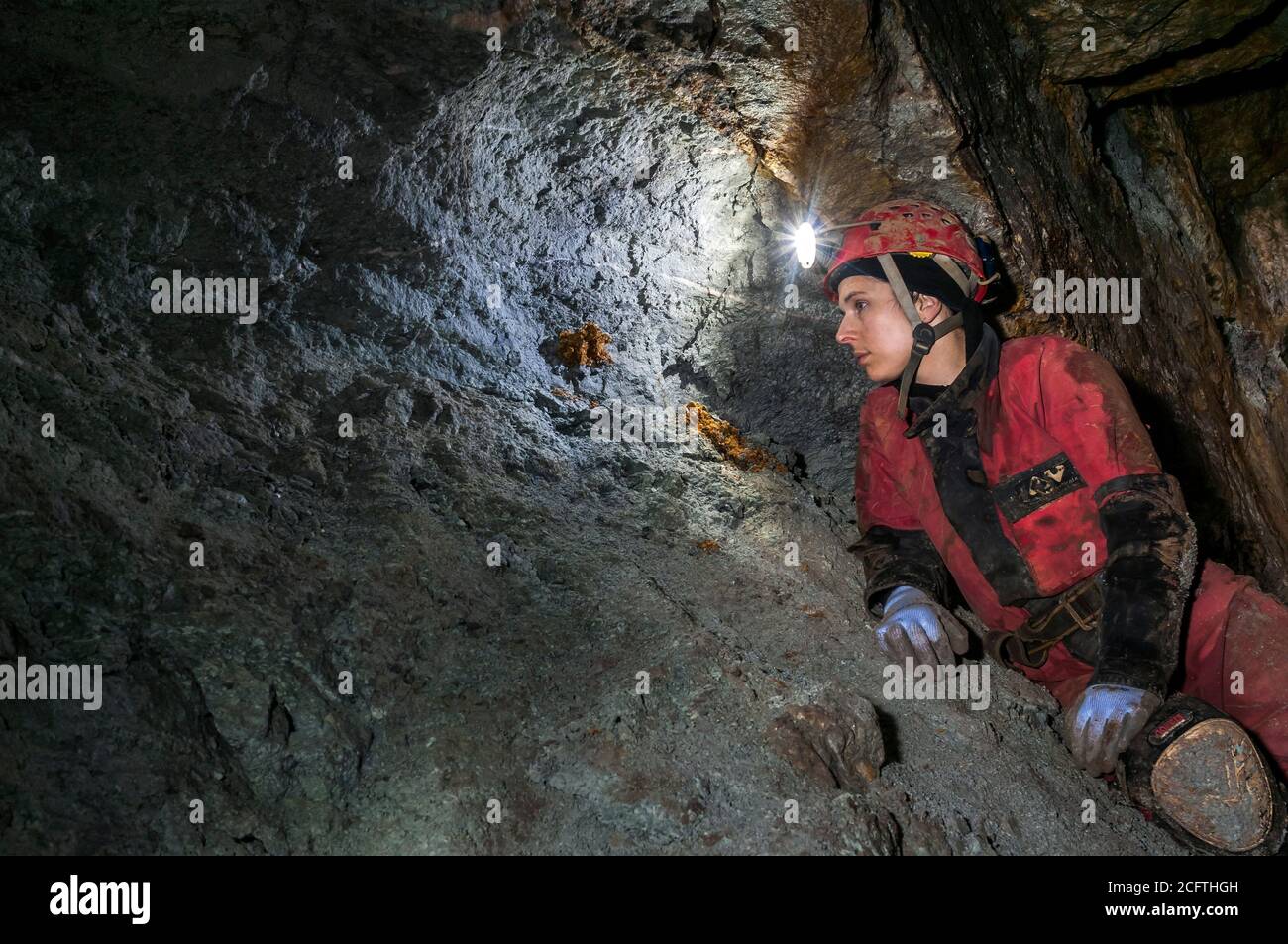 Exposure of light-blue volcanic ash (tuff) near a mineral vein in an ...