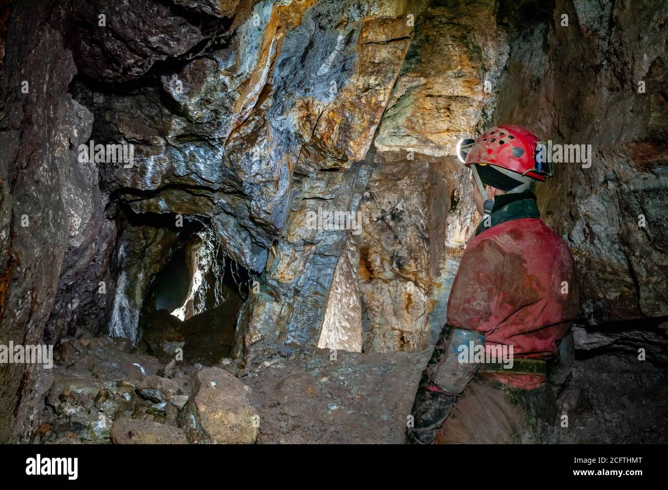 Worked-out stope in an old lead mine in Derbyshire, with light-blue ...