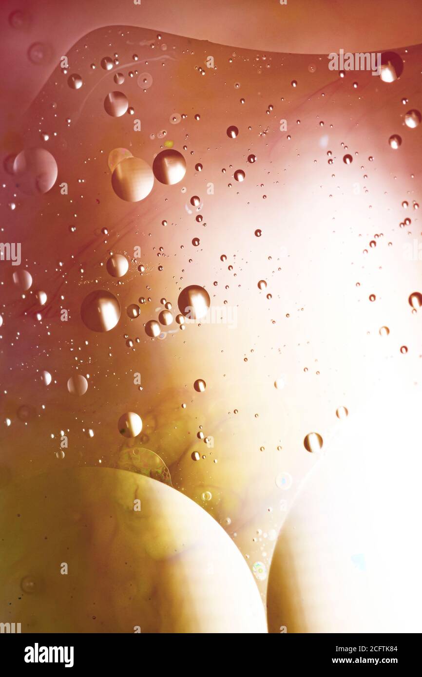 Abstract pattern of oil floating on carbonated water Stock Photo - Alamy