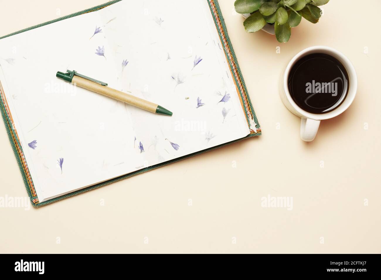 top view of workspace with coffee open notebook and pen. flat lay flat ...