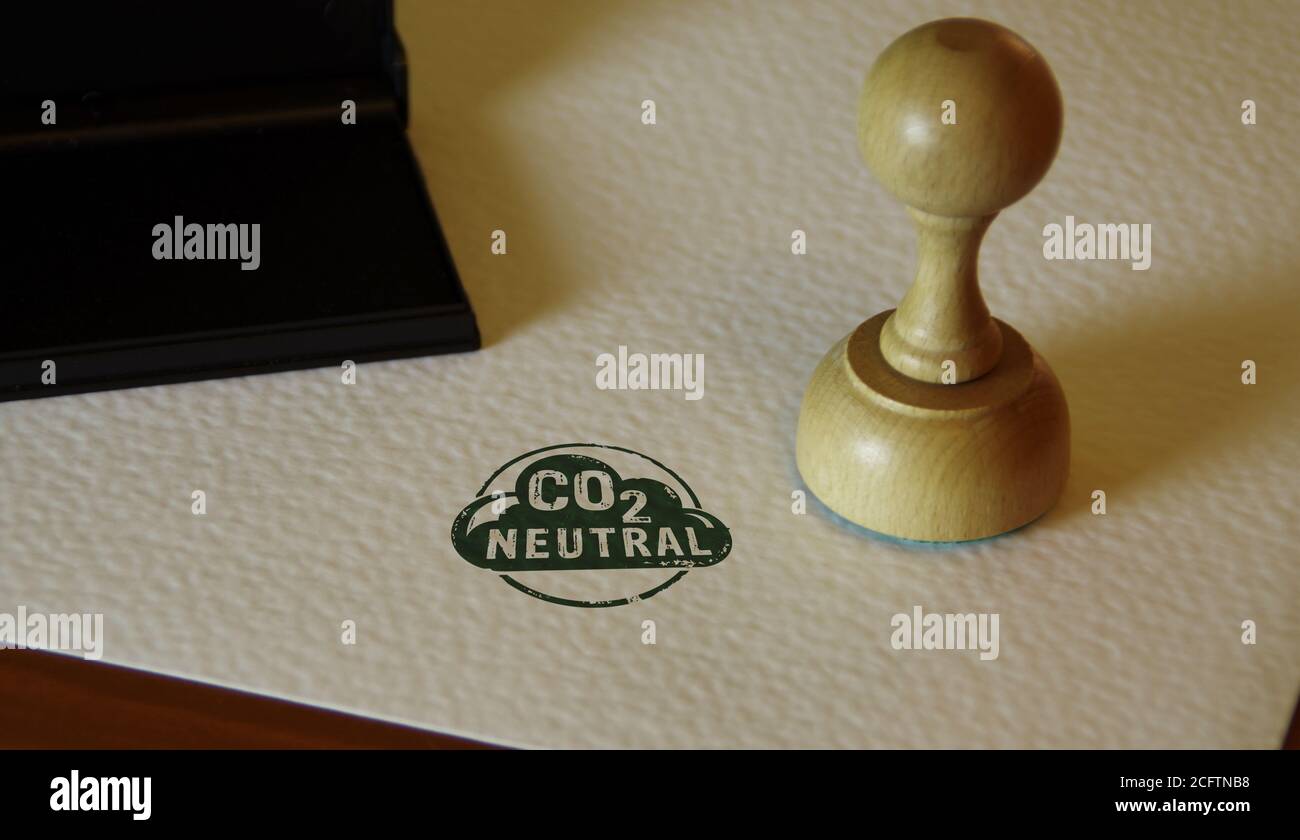 CO2 carbon neutral emission stamp and stamping hand. Ecology, nature ...