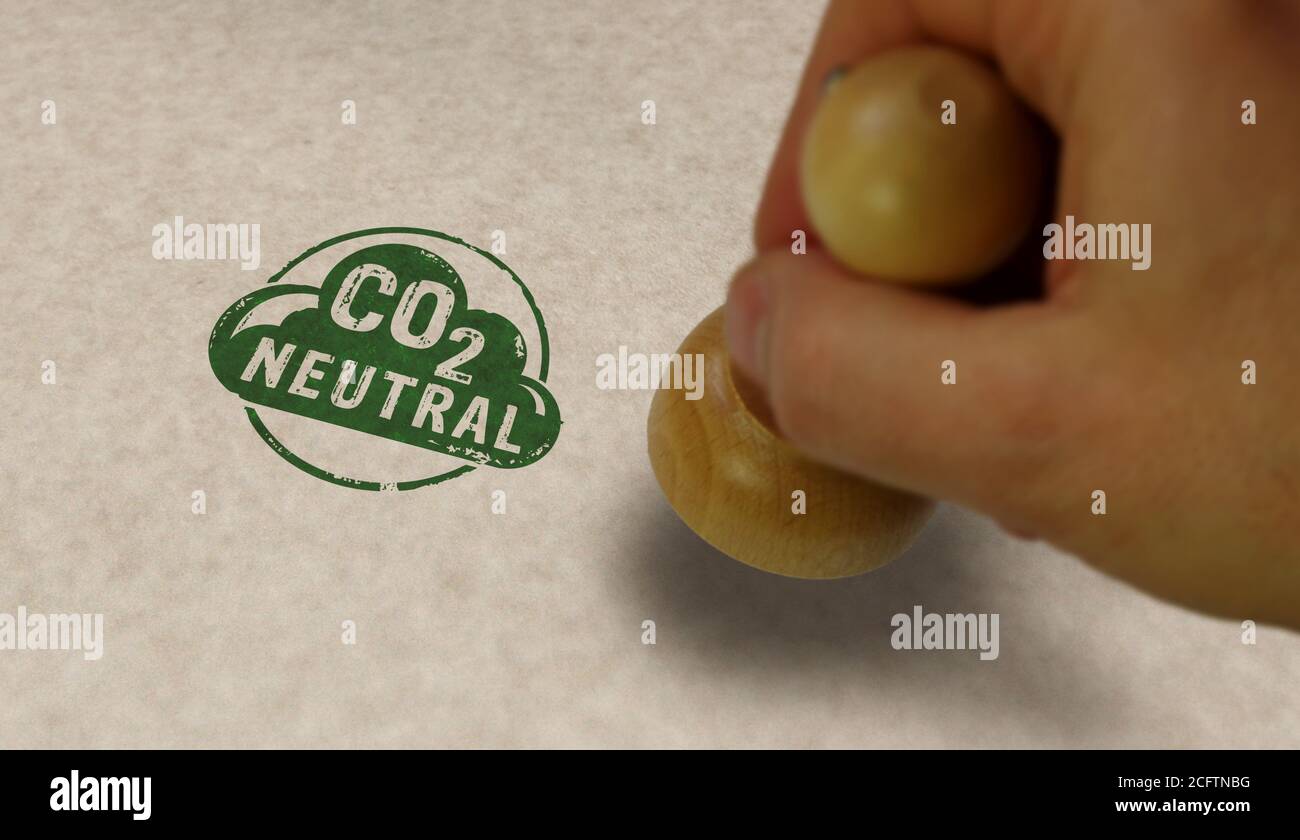 CO2 carbon neutral emission stamp and stamping hand. Ecology, nature ...