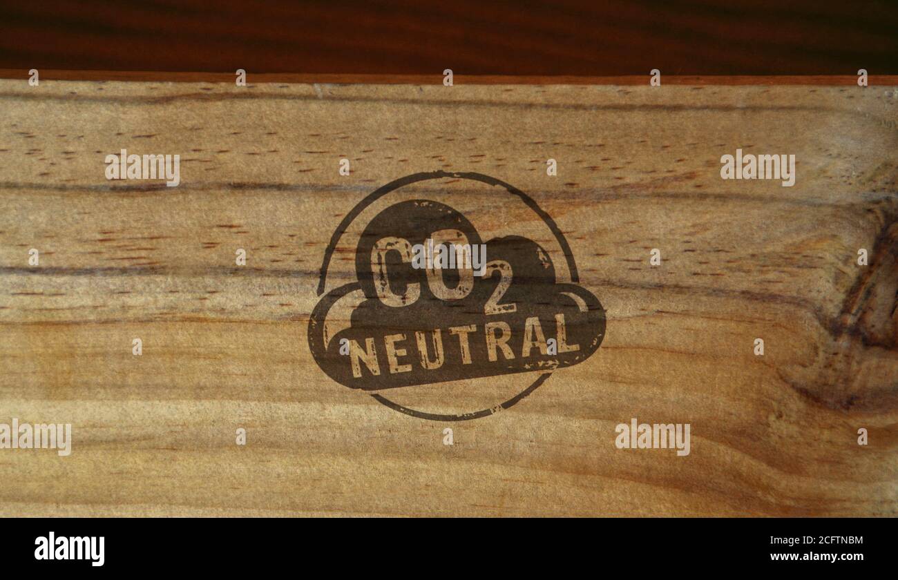 CO2 carbon neutral emission stamp printed on wooden box. Ecology ...