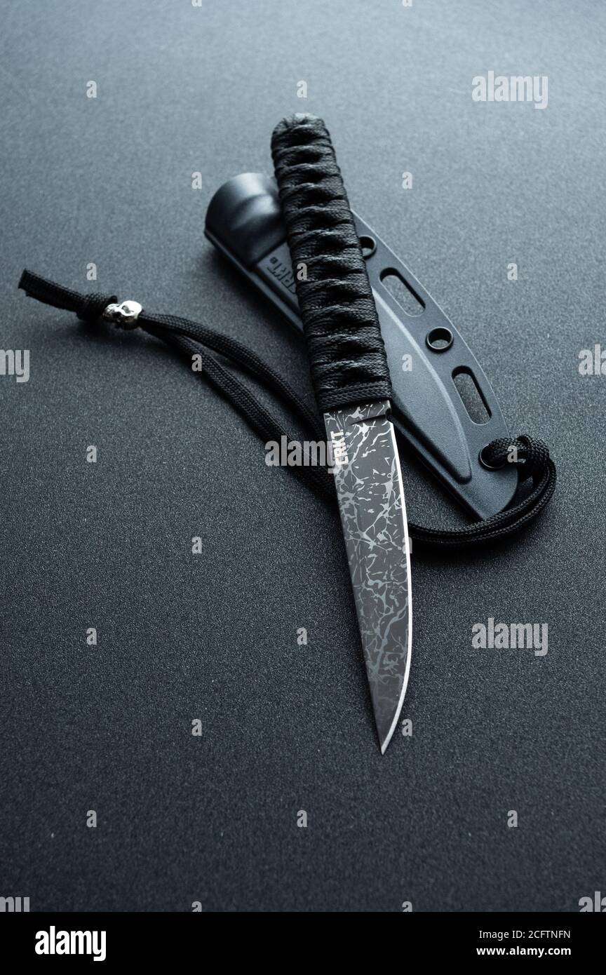 A sharp narrow knife with a fixed blade Stock Photo - Alamy