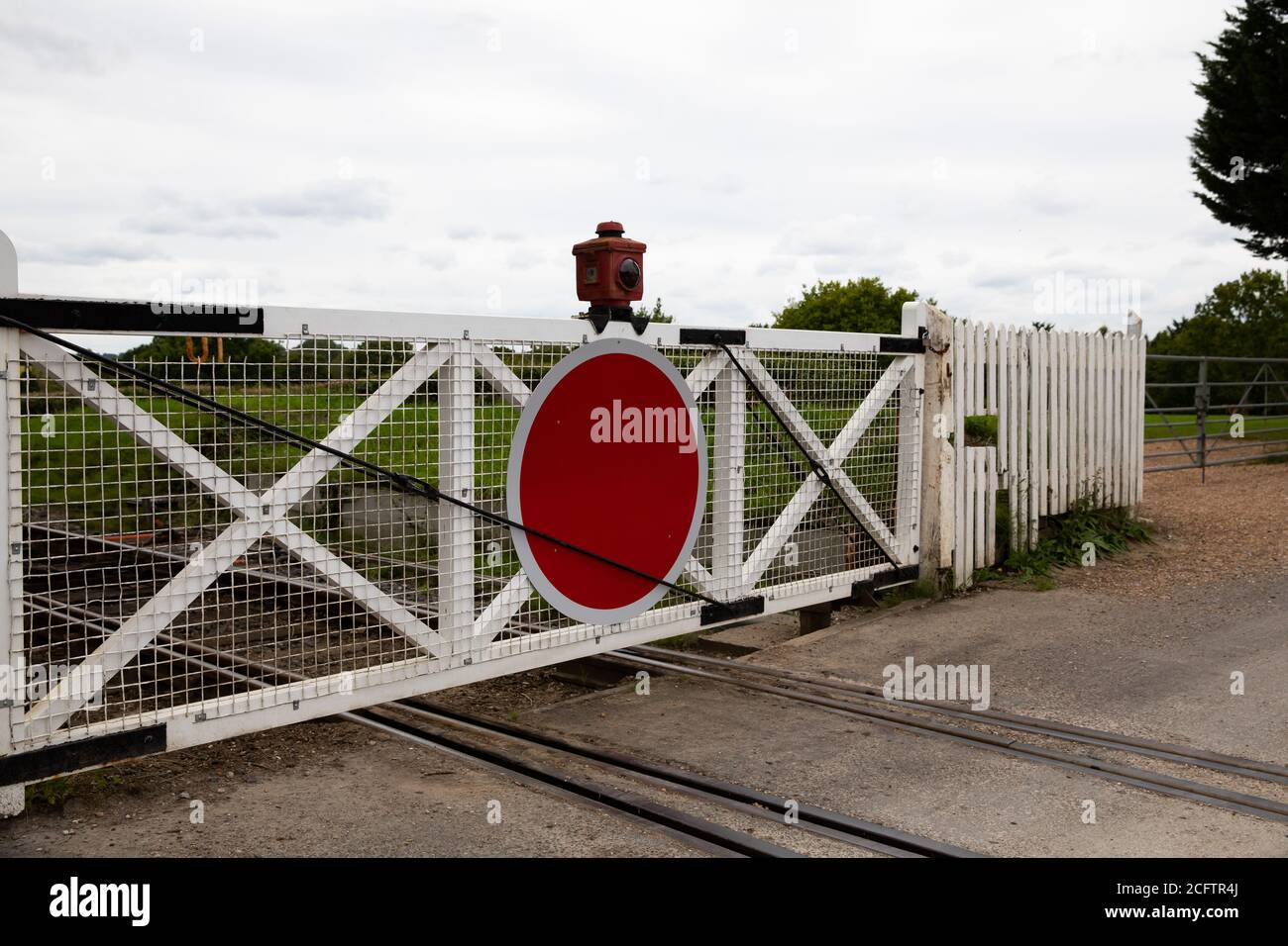 Railway crossing gate in Tenterden, Kent Stock Photo - Alamy