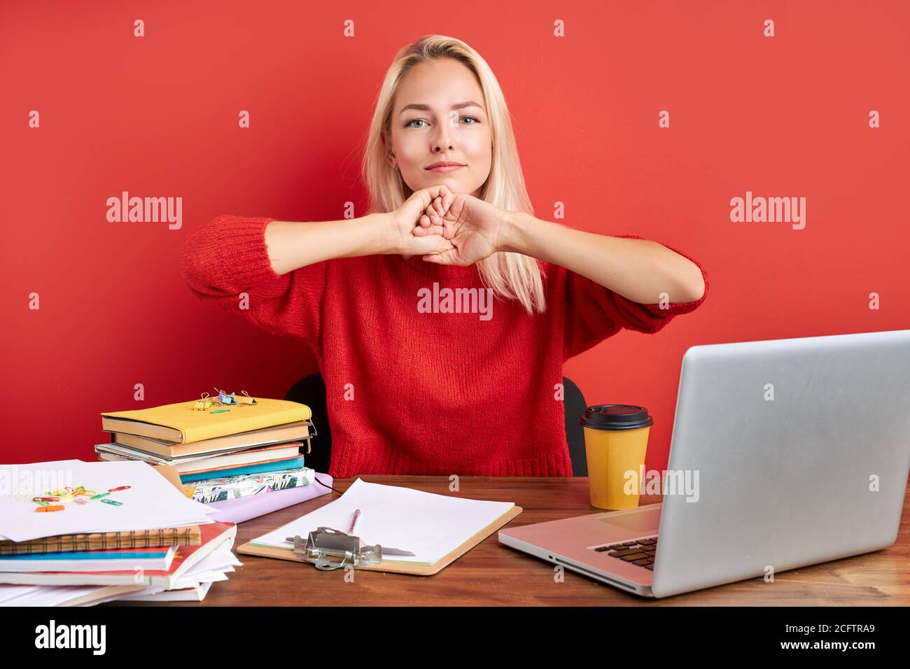 young secretary woman is bored at work place, blonde female sit at ...