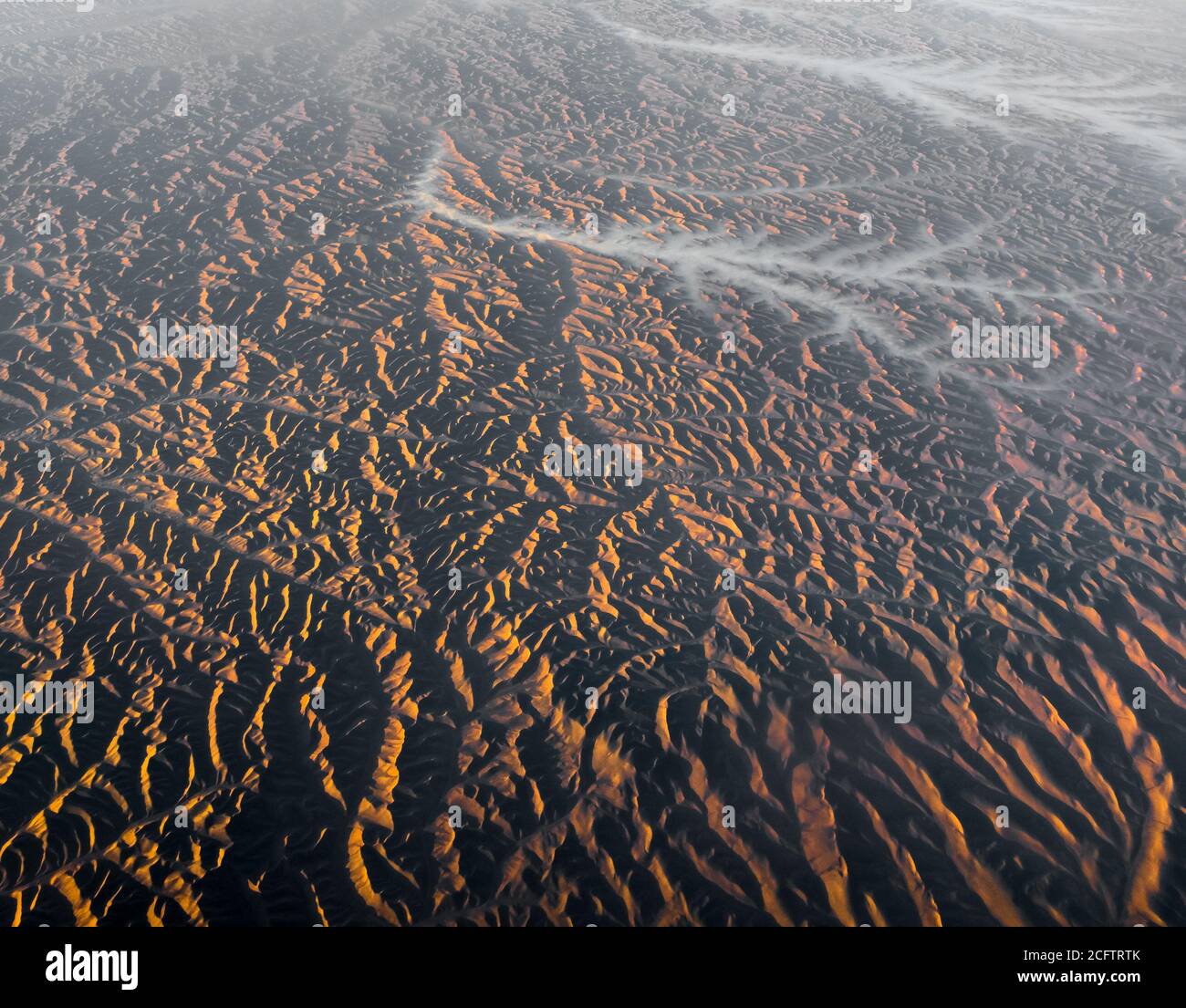 Aerial View from an Airplane. Flying above Beautiful Land at Sunrise ...