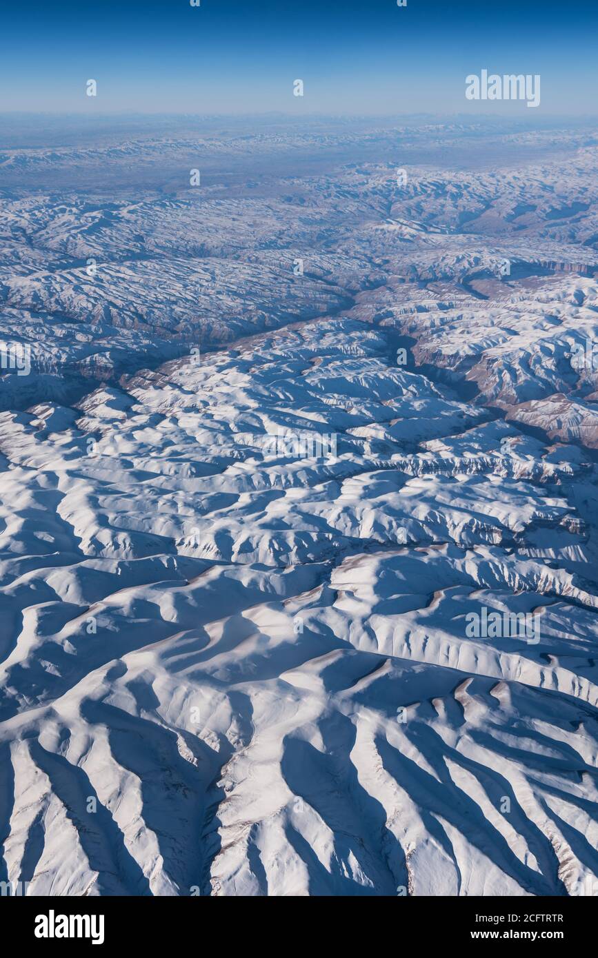 Aerial View from an Airplane. Flying above Beautiful Land at Sunrise ...