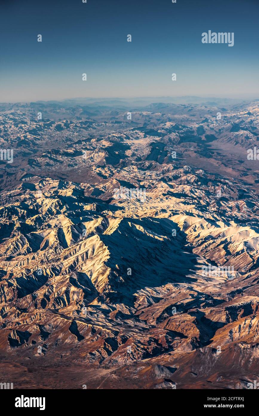 Aerial View from an Airplane. Flying above Beautiful Land at Sunrise ...