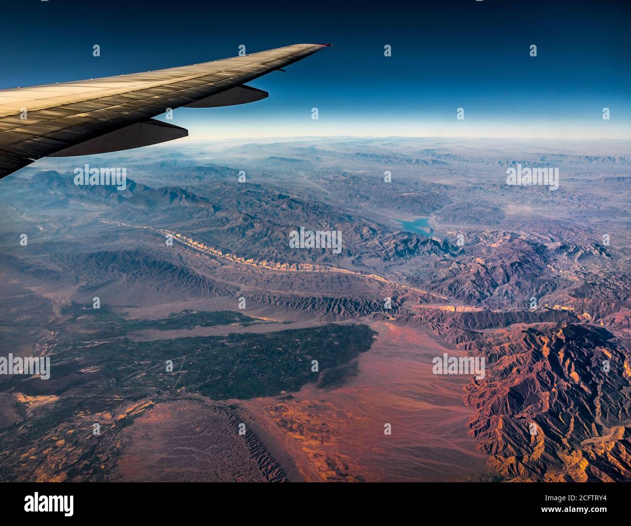 Aerial View from an Airplane. Flying above Beautiful Land at Sunrise ...
