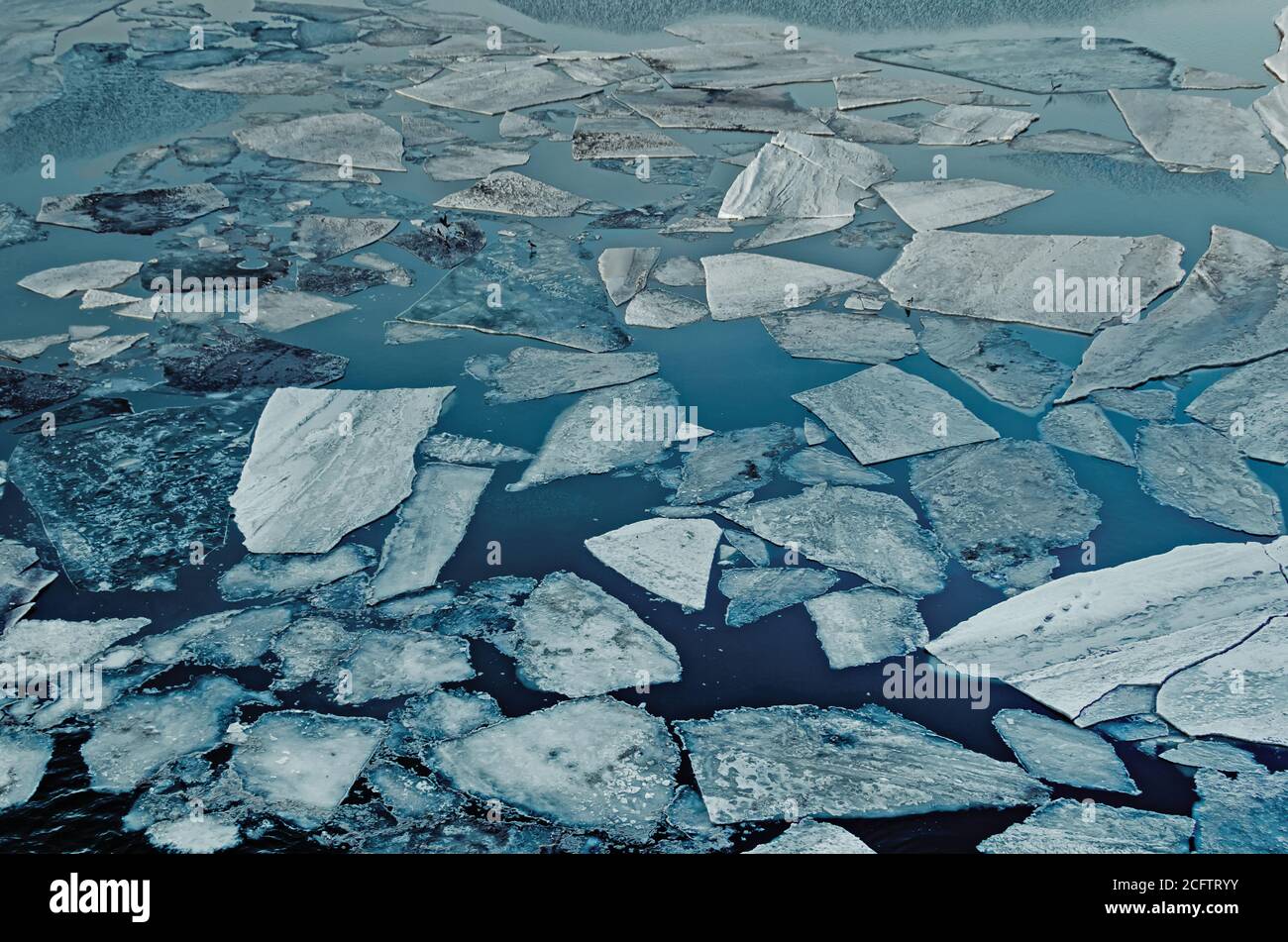 Natural ice blocks in water. Sea ice during freezing winter weather ...