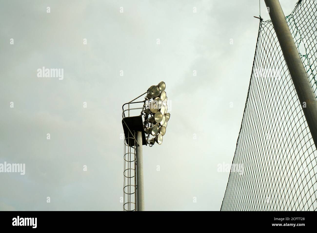 Low angle shot of stadium lights at a football field Stock Photo - Alamy