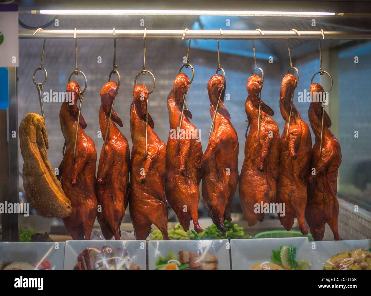 Tasty Roast Duck Hanging in Restaurant Stock Photo - Alamy