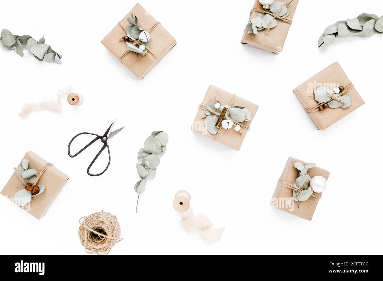 Christmas pattern, texture made in of craft boxes and green branches in ...