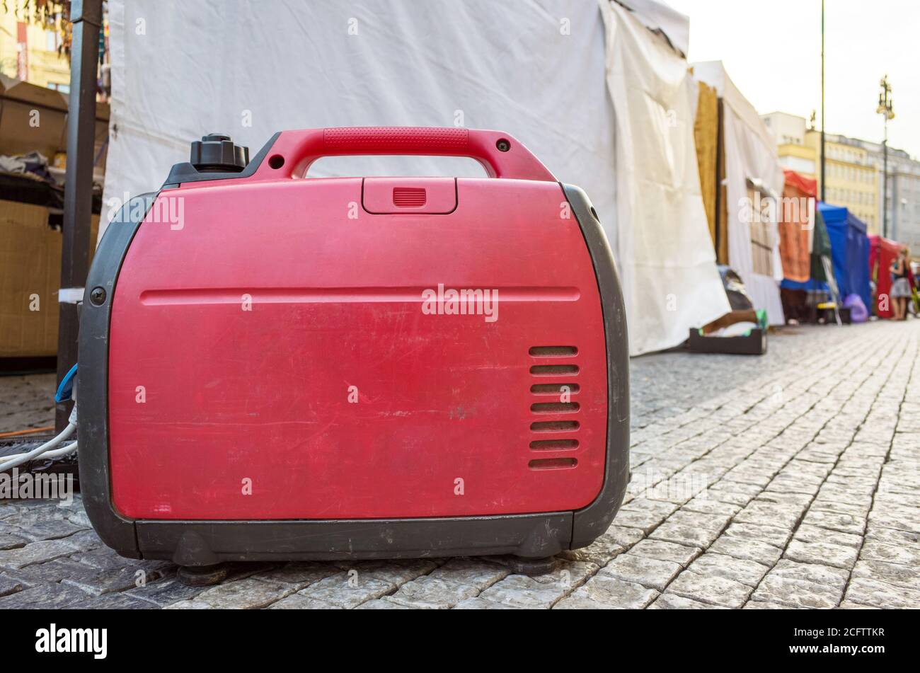 Using portable electric diesel generator on the street Stock Photo - Alamy
