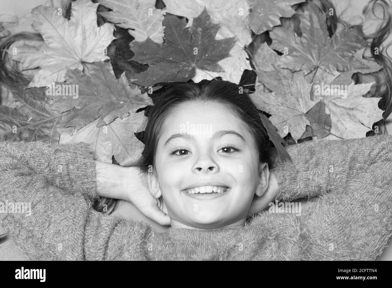 With smile on her lips. Happy smile of beauty model. Small child with ...