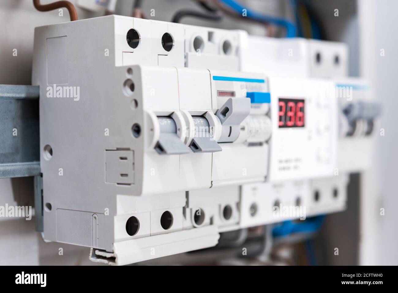 Closeup view automatic fuses and voltage relay. Electrical background ...