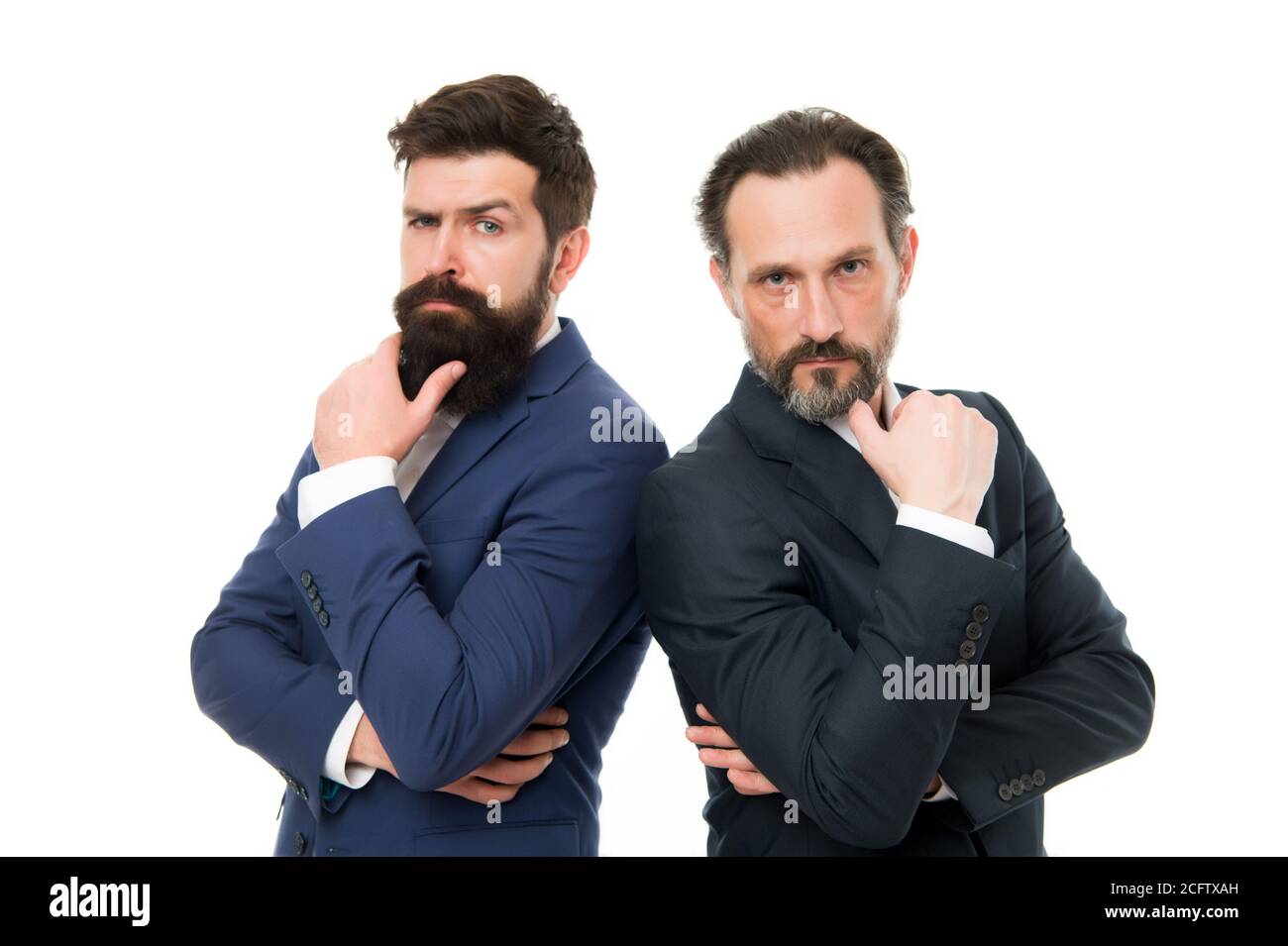 Brainstorming. Serious businessmen isolated on white. Business partners ...