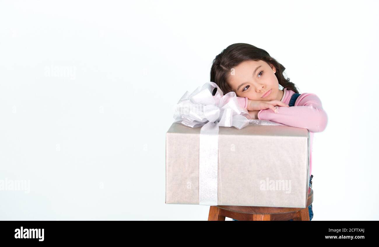 Box with ribbon bow and little girl. Box with present or gift Stock ...