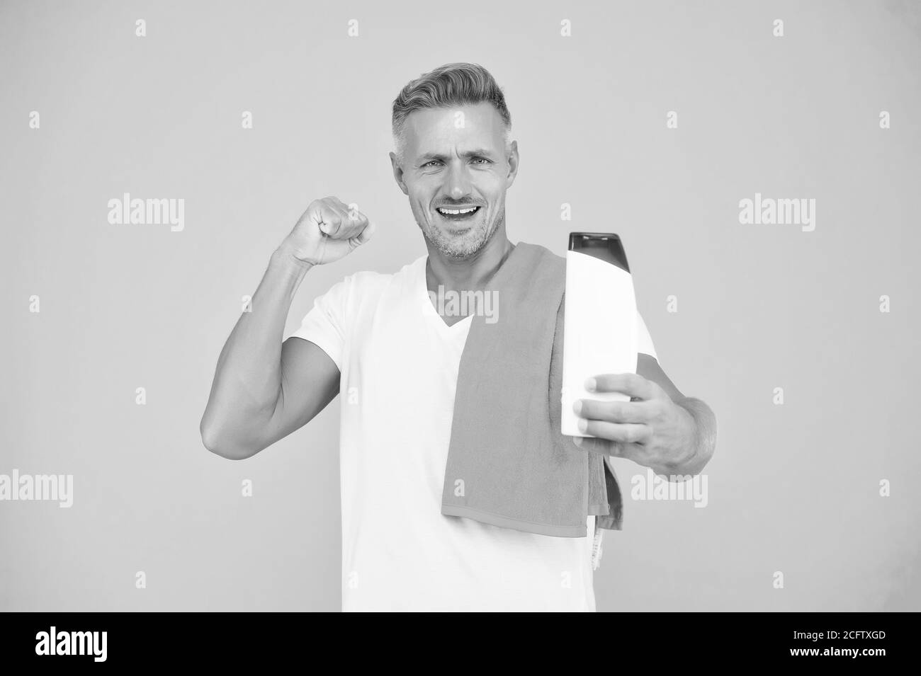 Enjoying morning routine. strong guy presenting gel. male beauty and ...