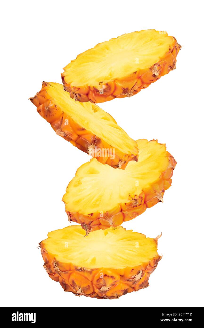 falling pineapple slices isolated on white background with full depth ...