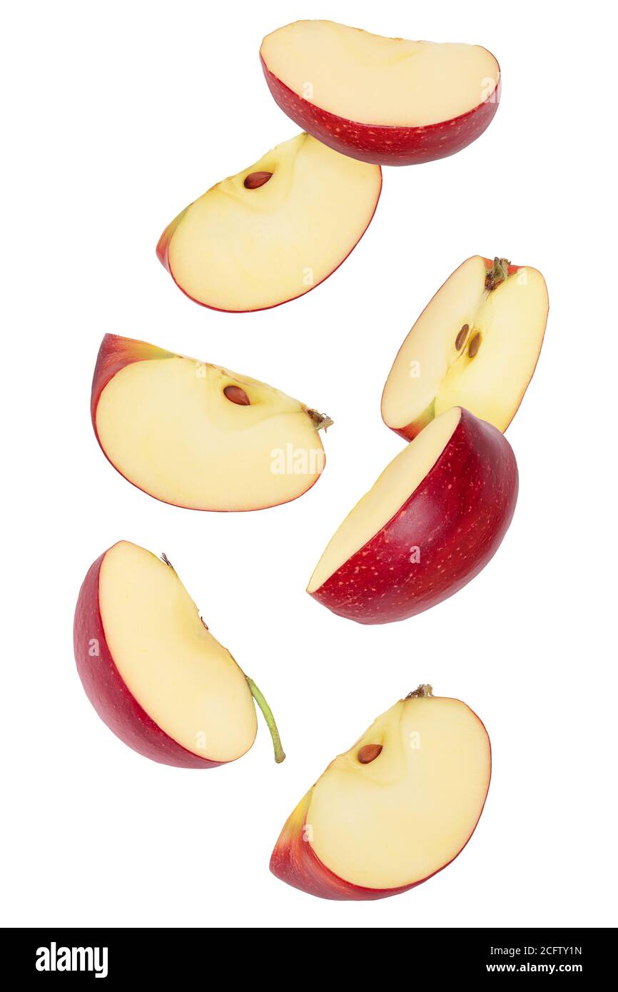 falling Red apple slices isolated on white background Stock Photo - Alamy