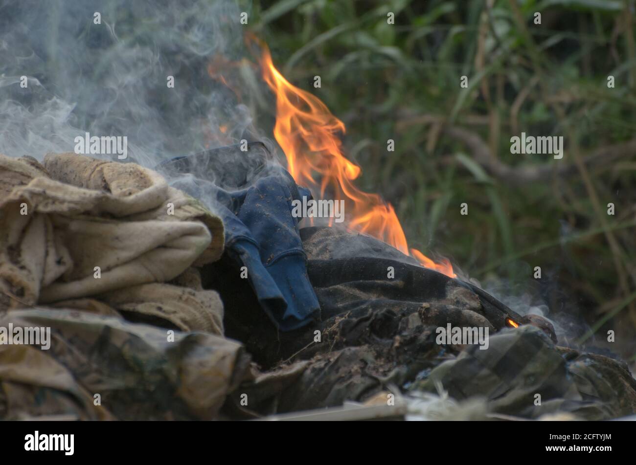 Burning clothes hi-res stock photography and images - Alamy