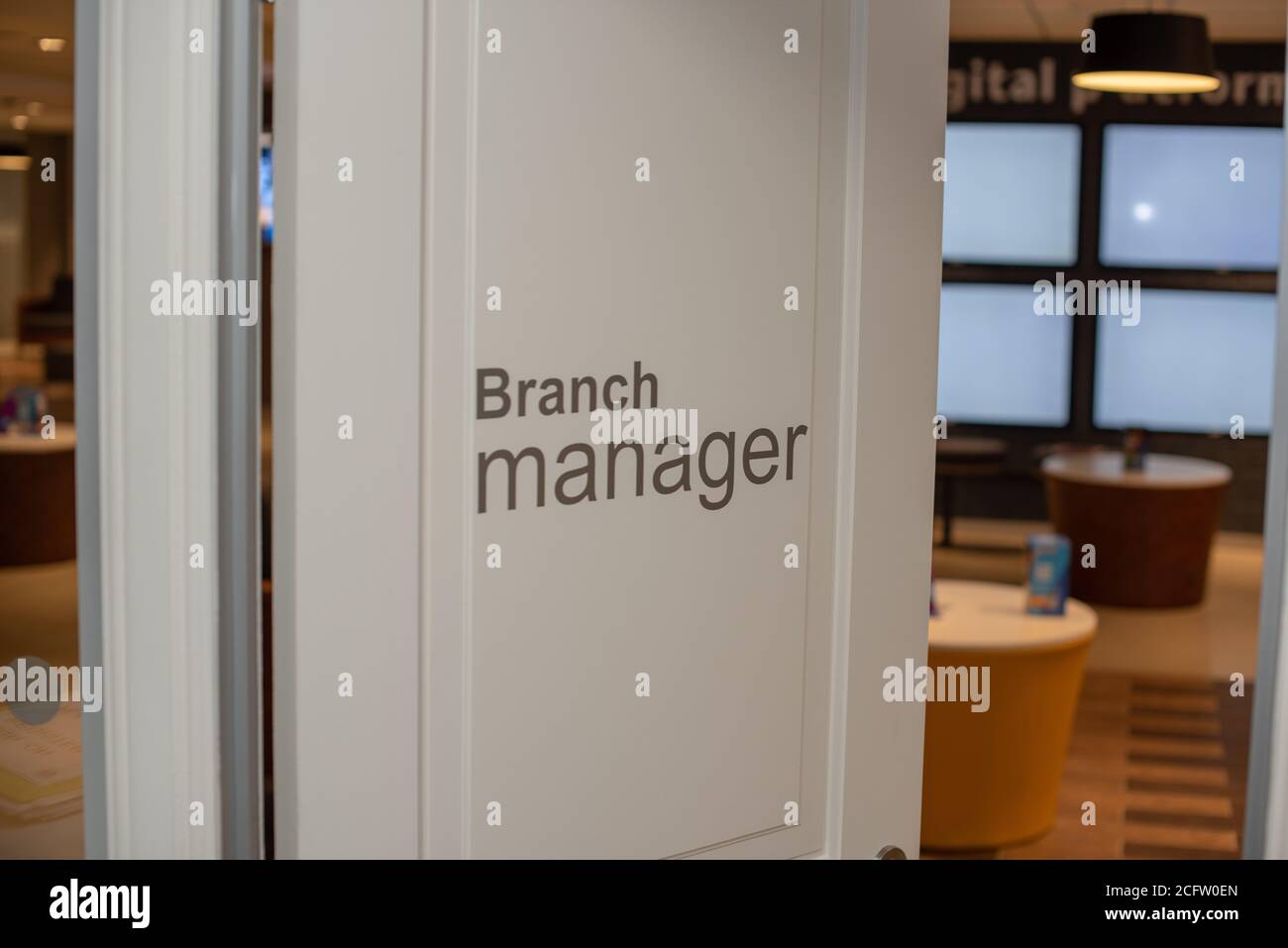 Branch manager text on door Stock Photo - Alamy