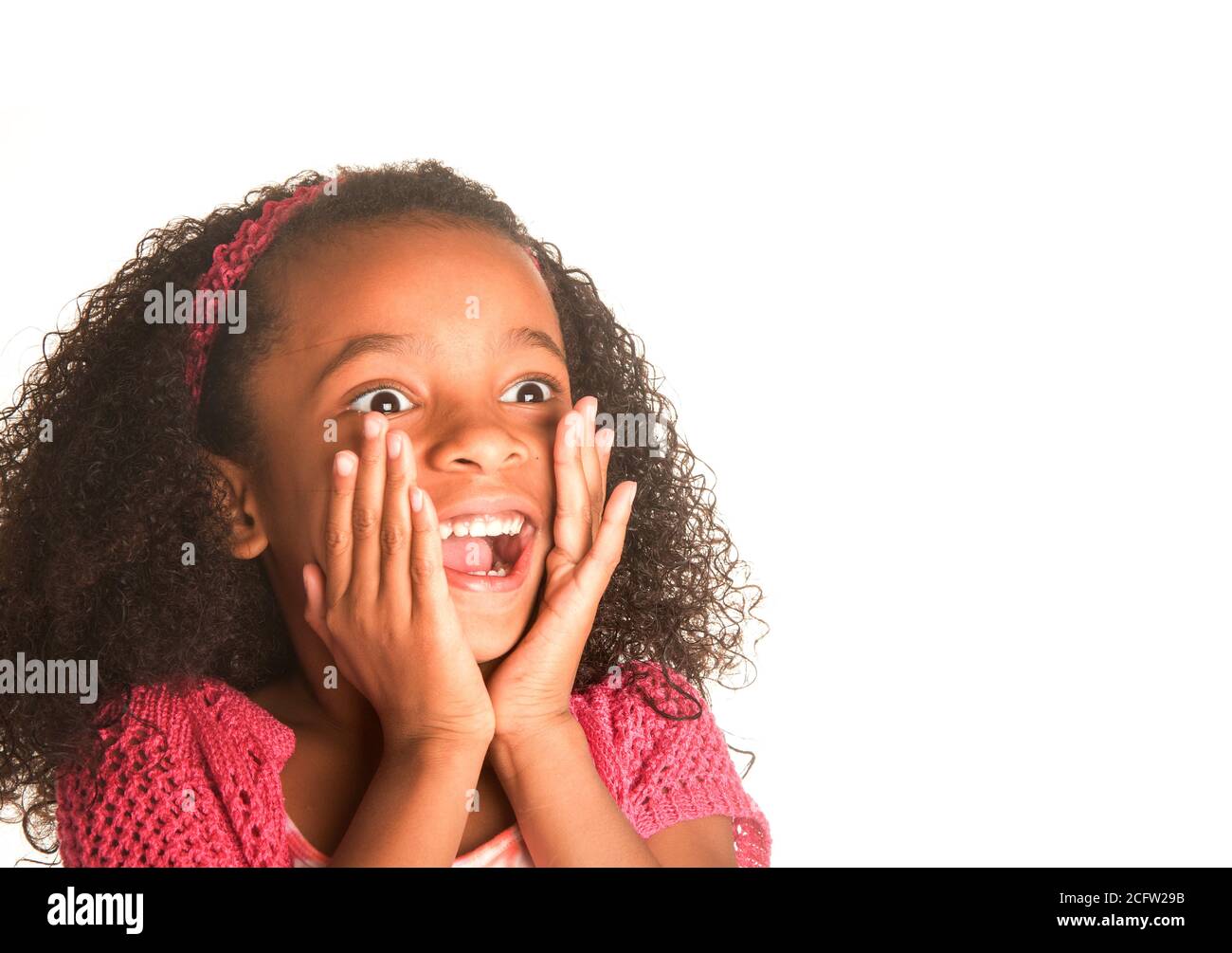 Little girl calling out excitedly, hands to mouth Stock Photo - Alamy