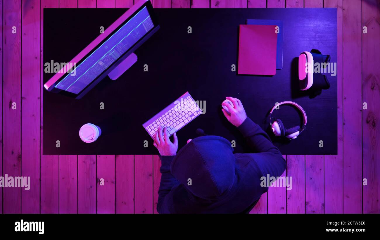 Software developer computer at dark home office. Startup and hard ...