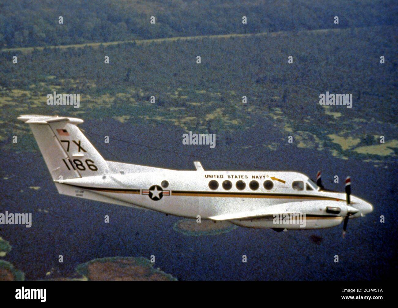 1979 - An air-to-air right side view of a UC-12B transport aircraft ...