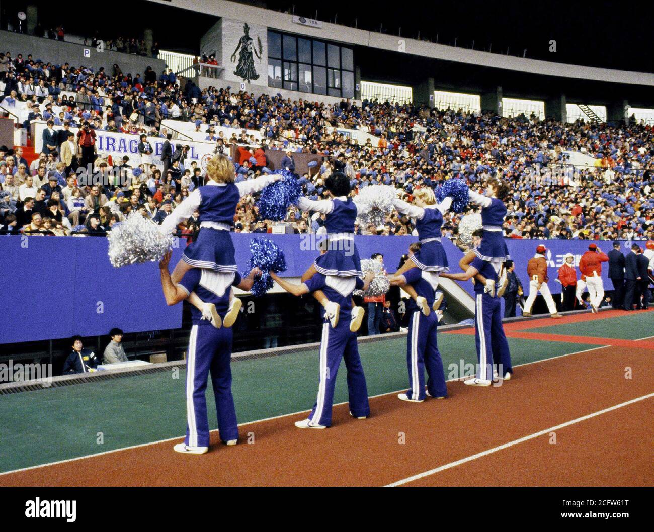 Air Force Academy Cadet Cheerleaders perform one of their routines ...