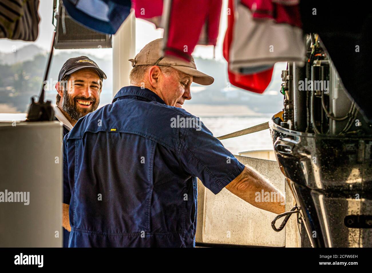 Maintenance work on a dinghy of the True North, Sunda Islands ...