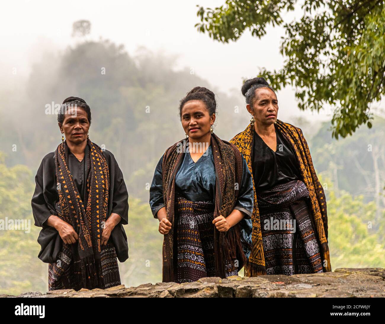 Indonesian People in traditional attire Stock Photo - Alamy
