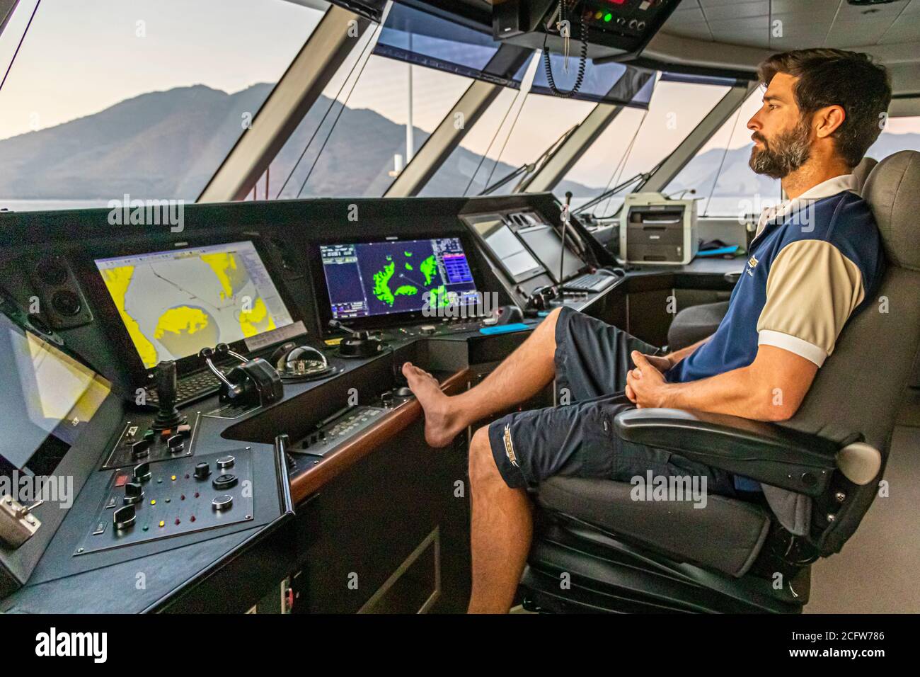 With the captain on the bridge during the Fire and Dragons Cruise of ...